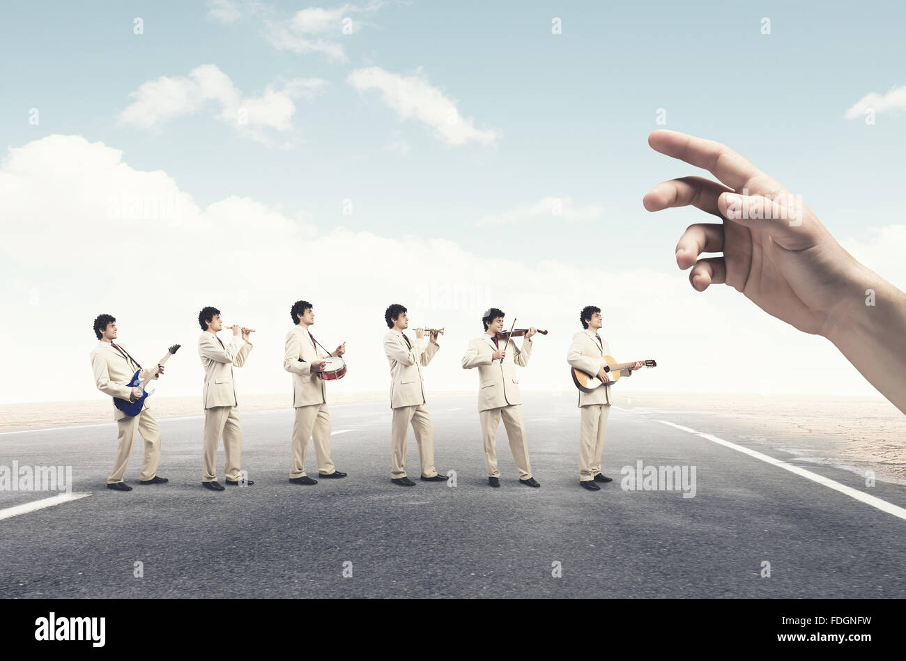 Man orchestra in suit playing different music instruments Stock Photo ...