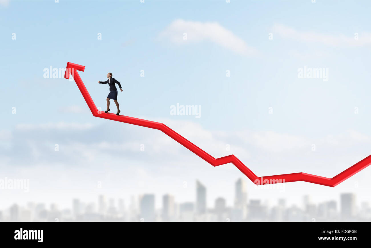 Young businesswoman running up on increasing arrow graph Stock Photo ...