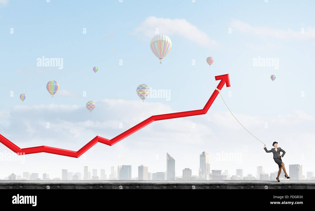 Businesswoman pulling arrow with rope and making it raise up Stock ...