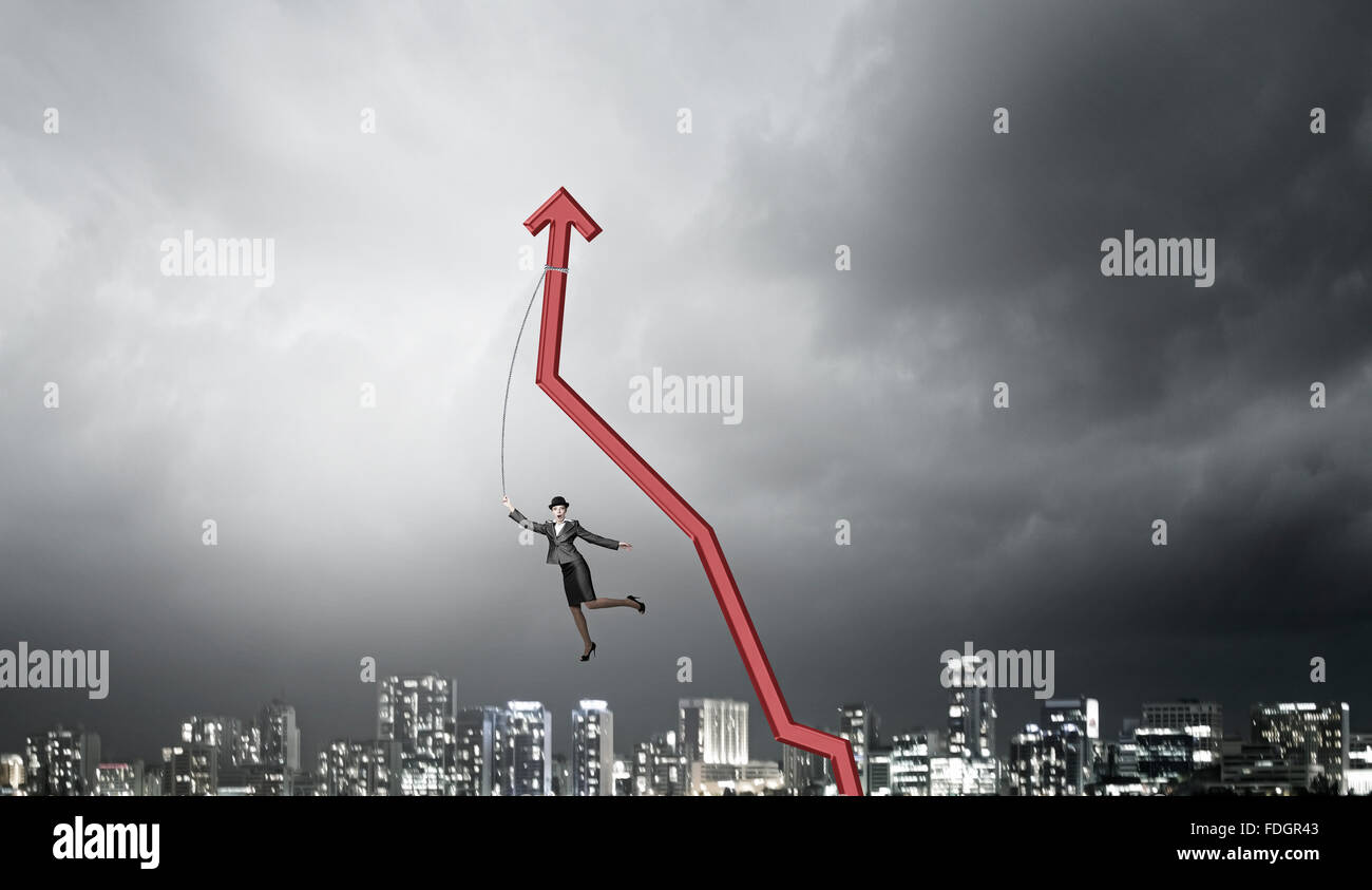 Businesswoman pulling arrow with rope and making it raise up Stock ...