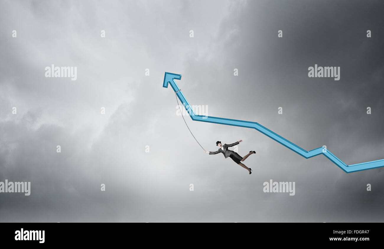 Businesswoman pulling arrow with rope and making it raise up Stock ...