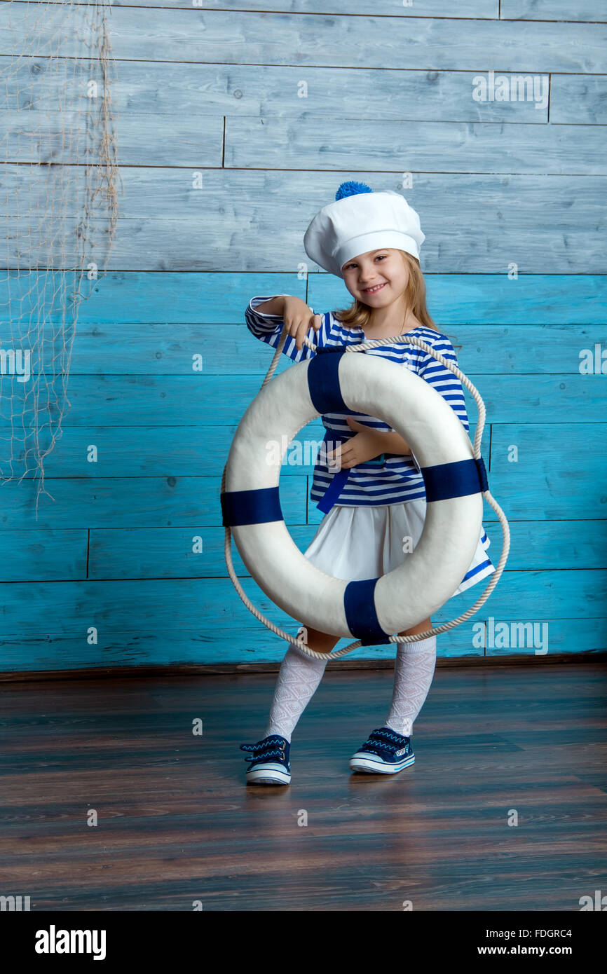 girl holding a life preserver Stock Photo - Alamy