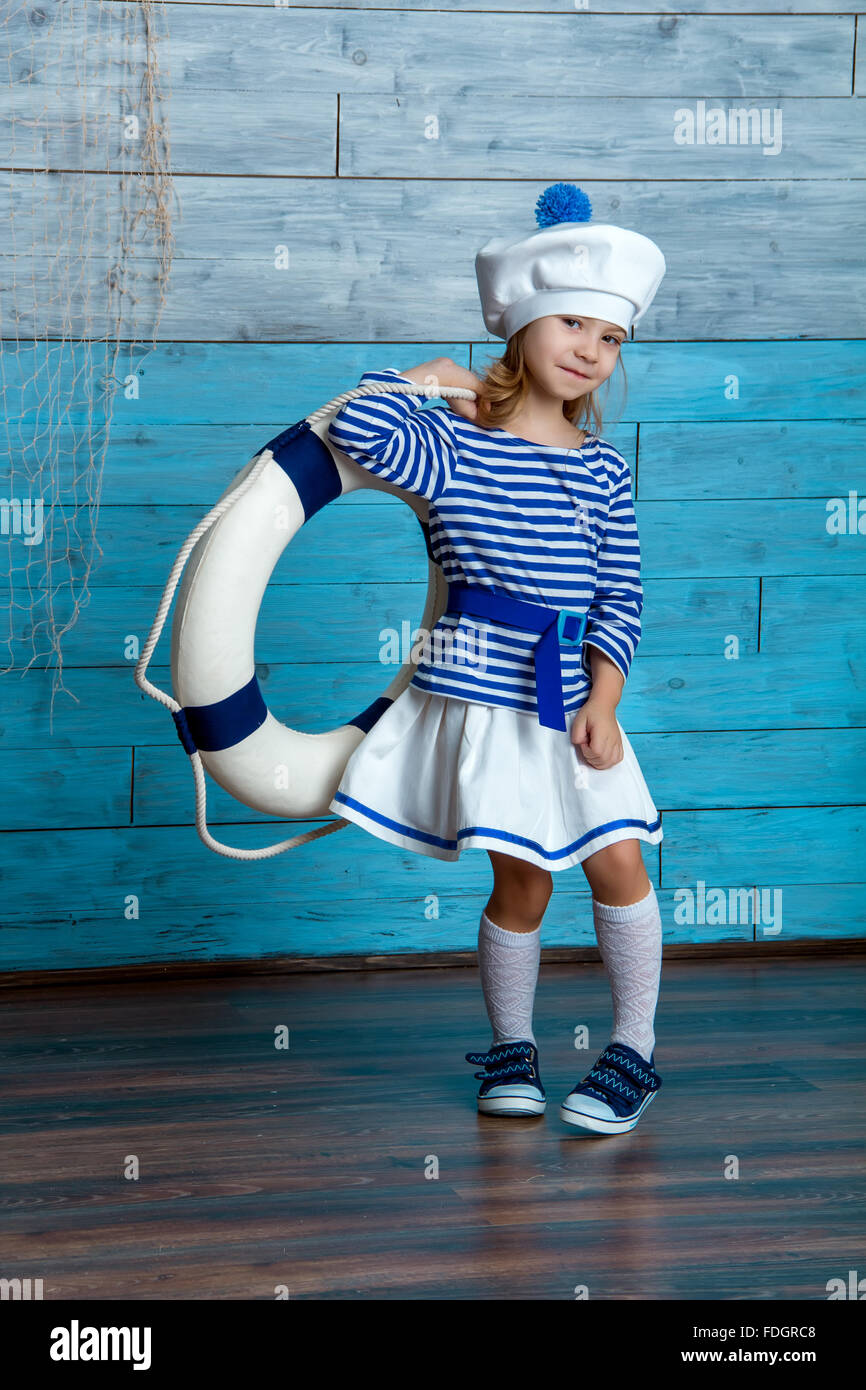 girl holding a life preserver Stock Photo - Alamy