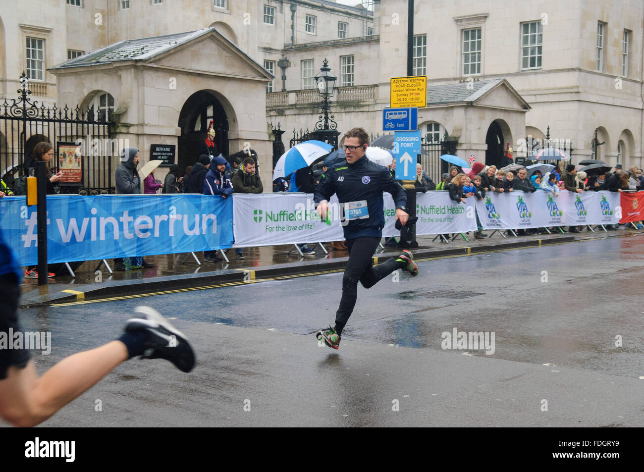 London, UK. 31st January 2016. Thousands of runners brave the rain for ...