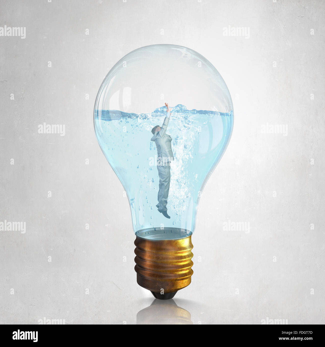 Glass light bulb filled with clear water and businessman inside Stock ...
