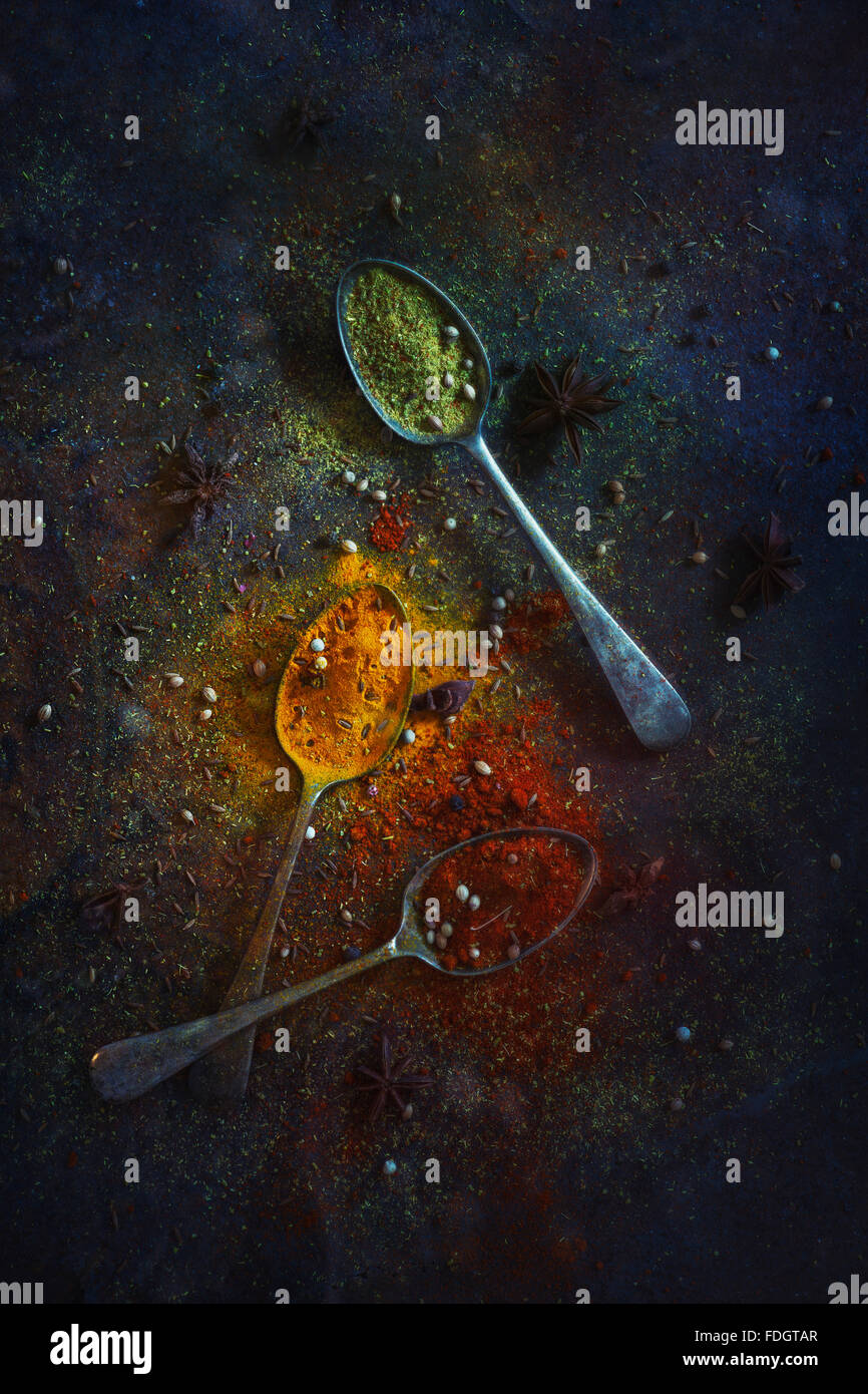 A selection of colourful spices on an old zinc table top Stock Photo ...