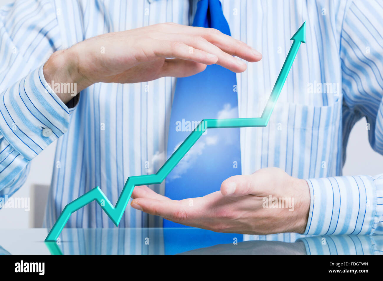 Hands of businessman covering rising growth graph Stock Photo - Alamy