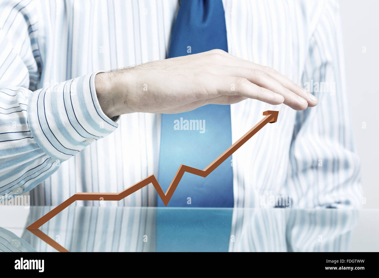 Hands of businessman covering rising growth graph Stock Photo - Alamy