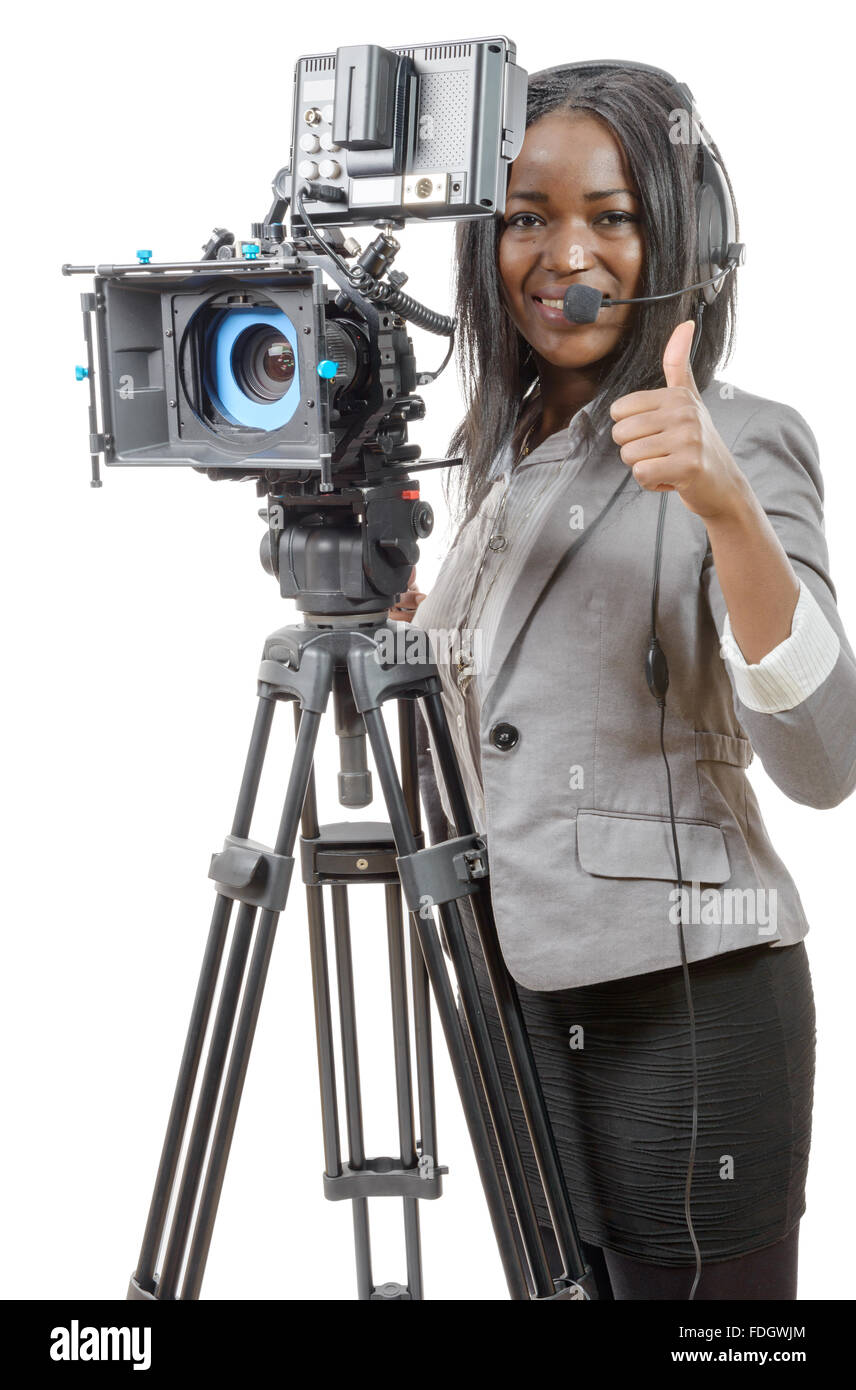 a young African American women with professional video camera and ...