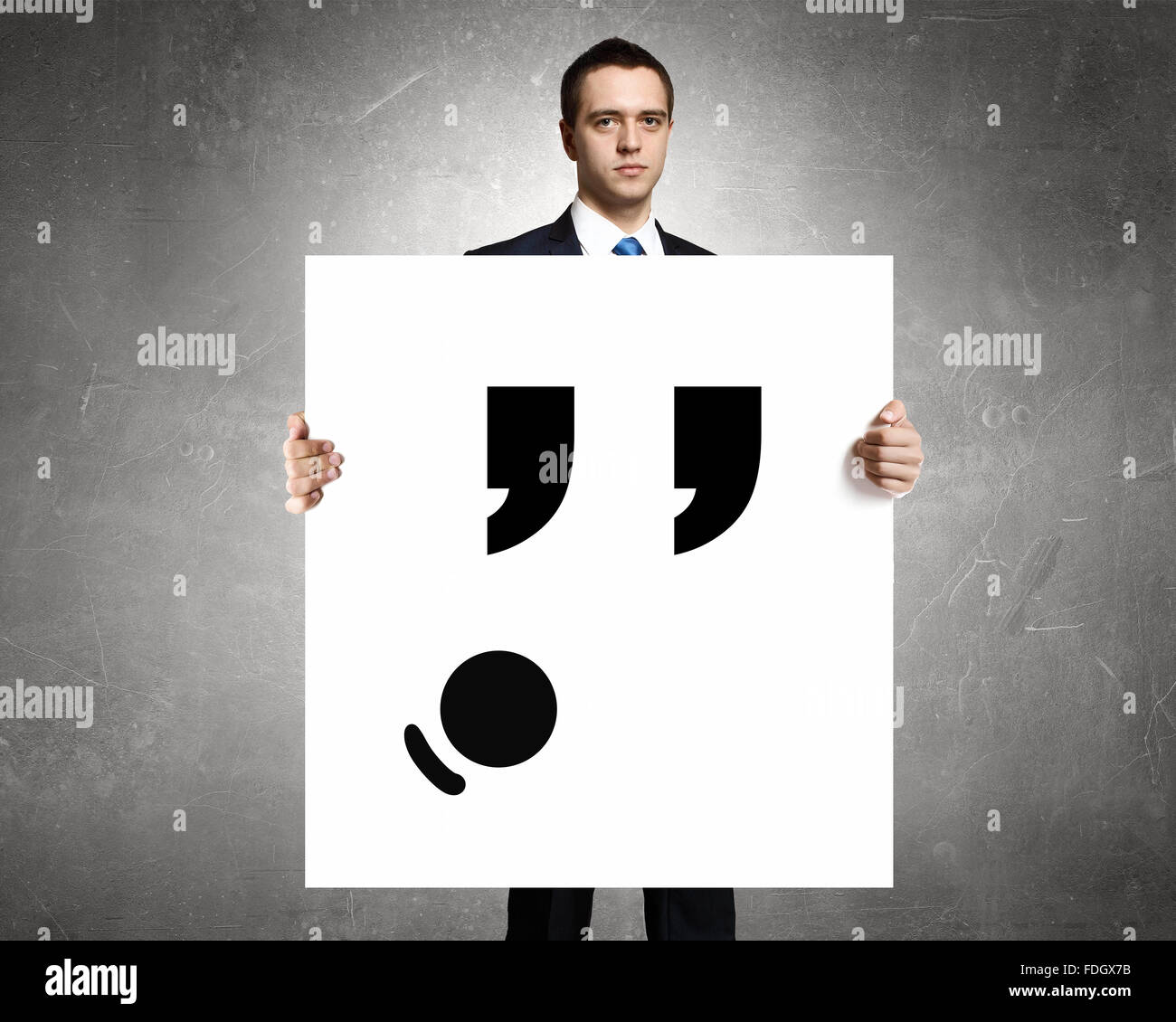 Businessman hold white board with sad face emoticon Stock Photo - Alamy
