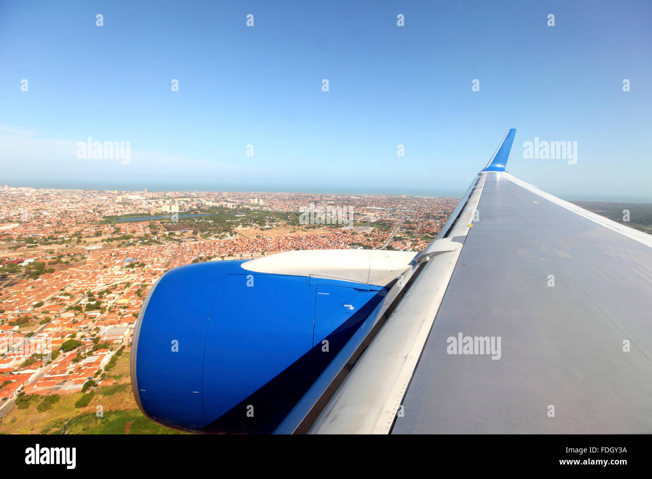 airplane fly in blue sky cloud around Stock Photo - Alamy