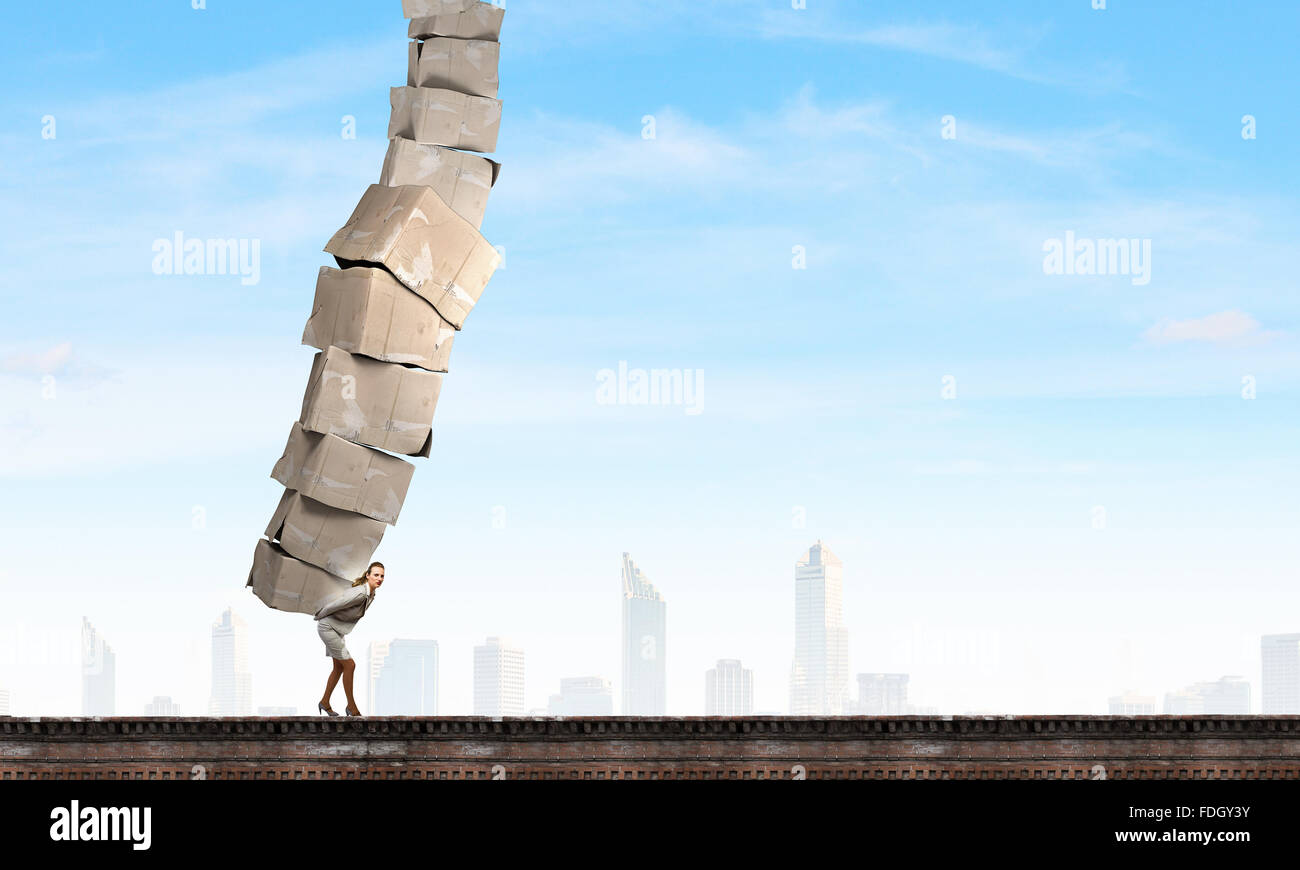 Businesswoman carrying big stack of carton boxes on her back Stock ...