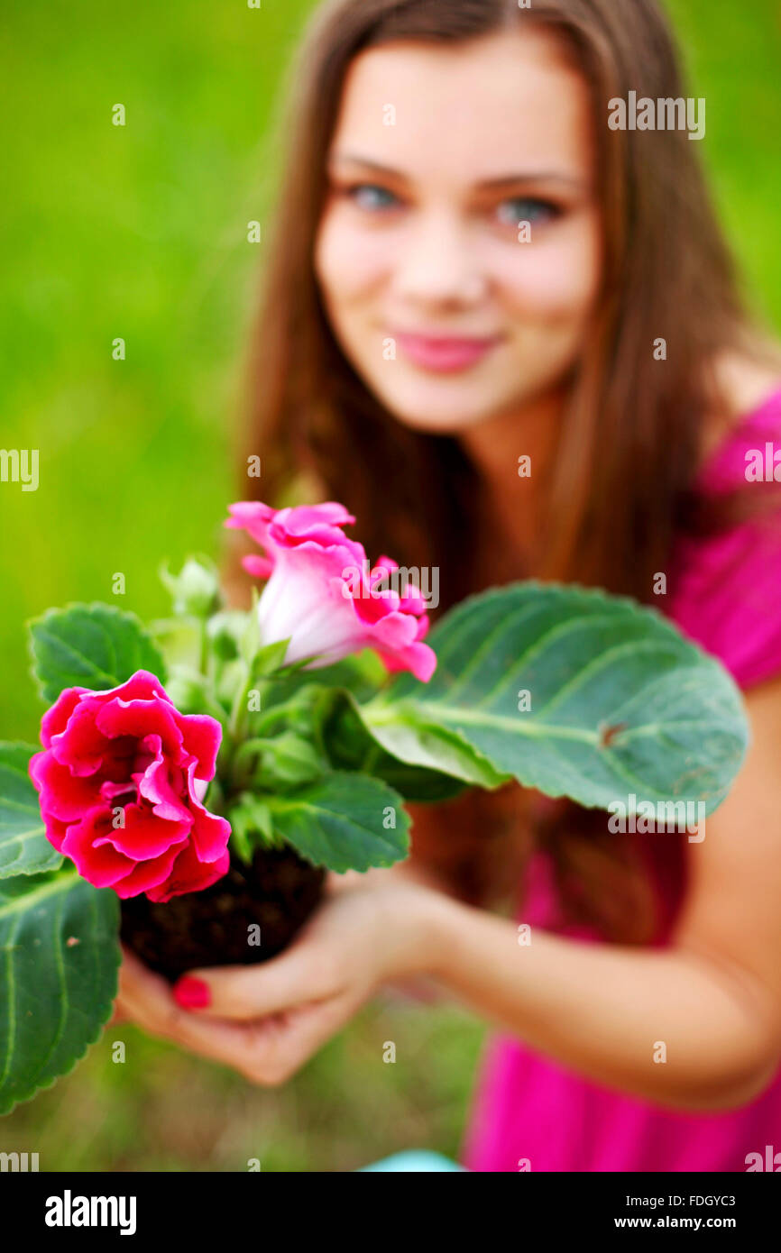 Woman hold flower Stock Photo - Alamy
