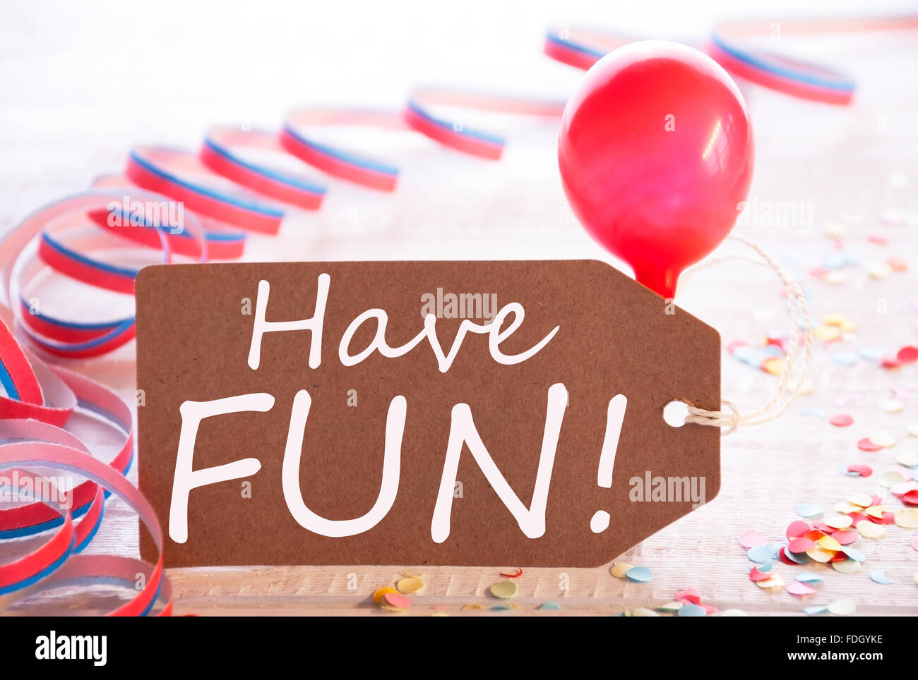Party Label With Streamer And Balloon, Text Have Fun Stock Photo - Alamy