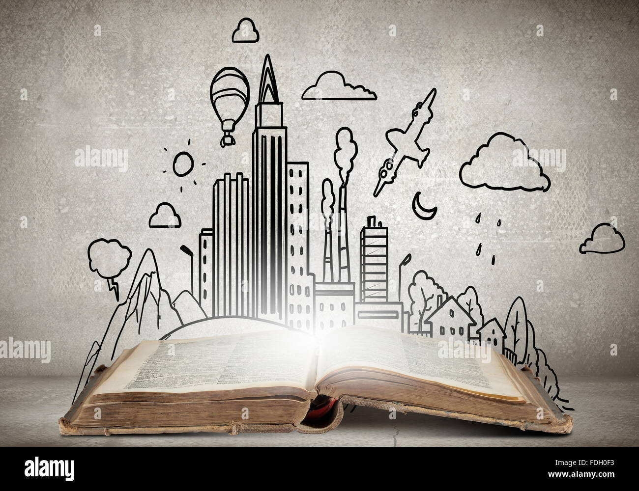 Opened book and hand drawing building construction sketches Stock Photo ...