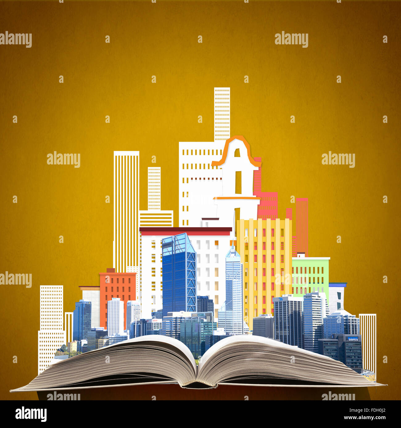 Opened book with modern city model on pages Stock Photo - Alamy
