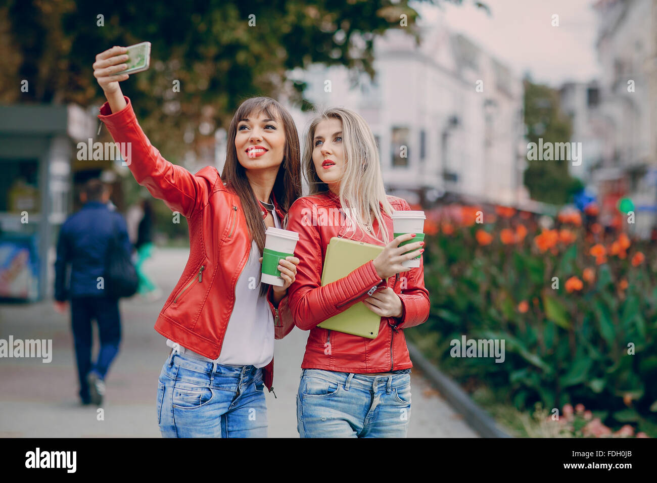 girls with phone Stock Photo - Alamy