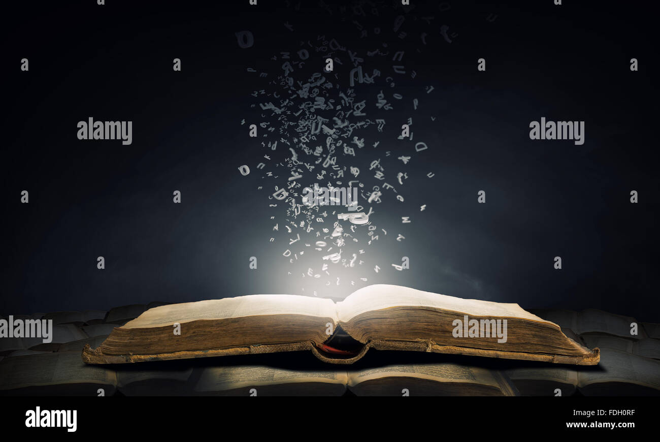 Old opened book characters flying hi-res stock photography and images ...