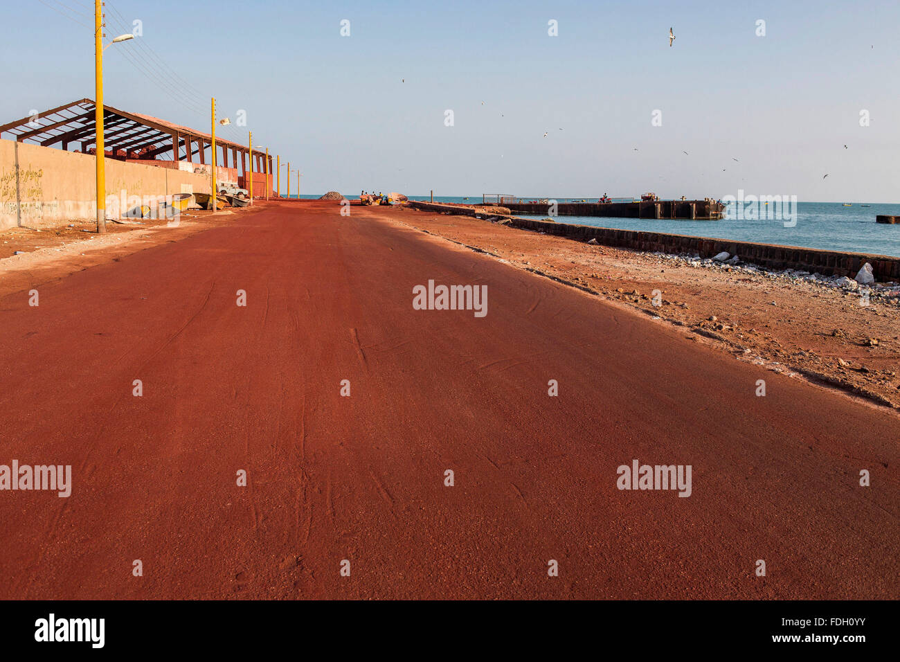 Road to red ochre warehouse in Hormoz, Iran Stock Photo - Alamy