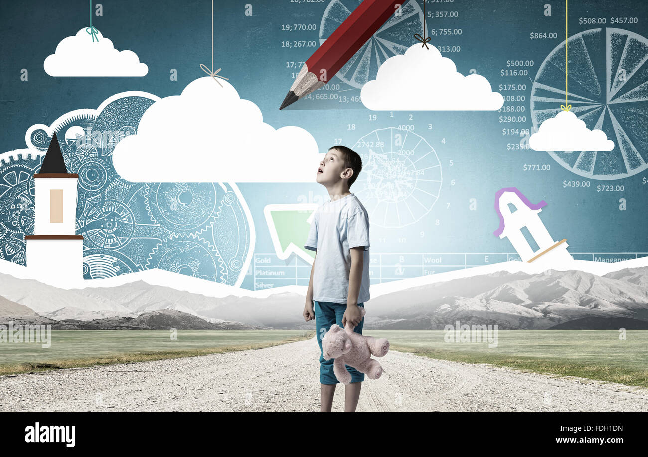 Cute little boy with toy bear on cloud background Stock Photo - Alamy