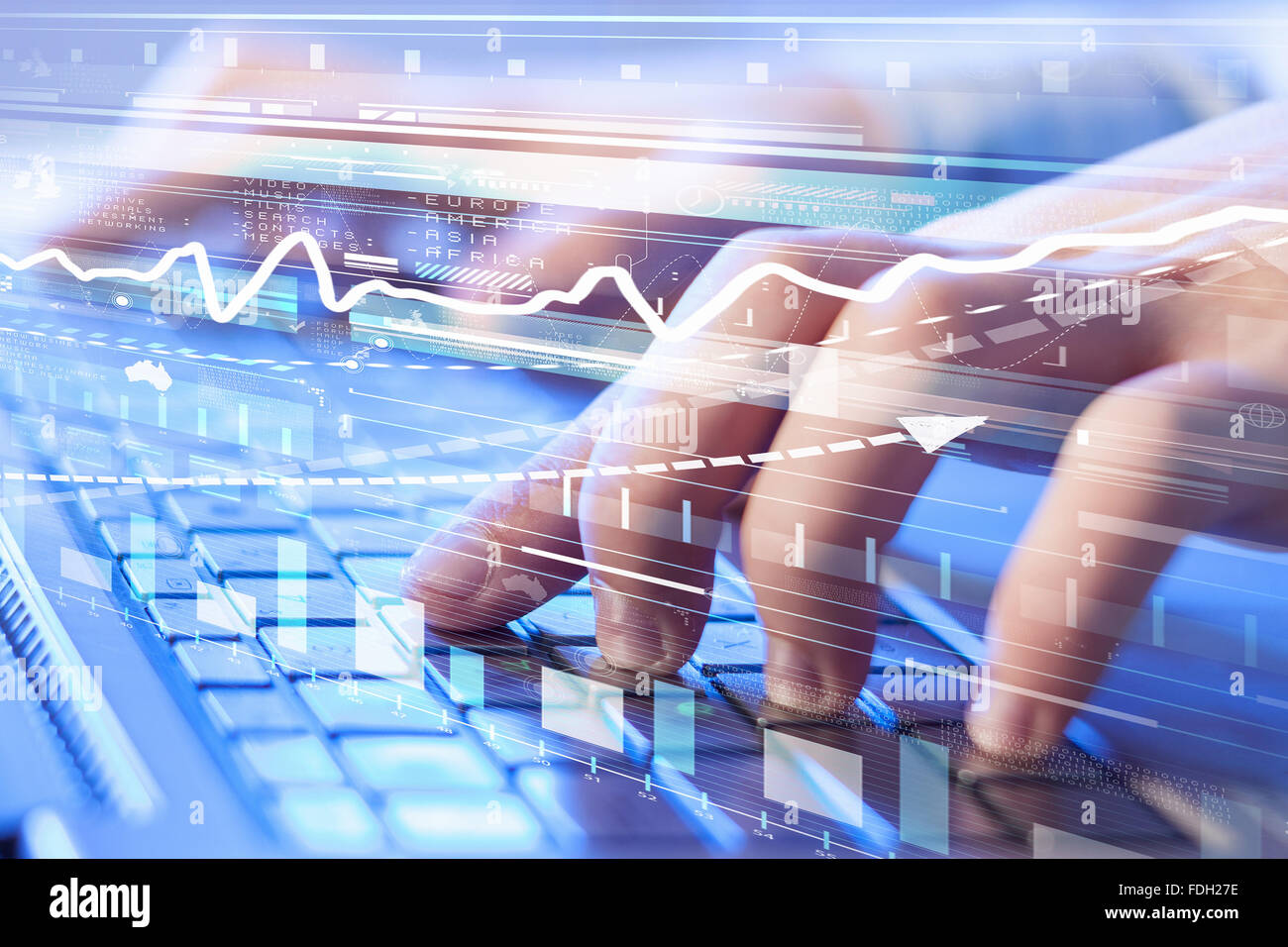 Hands using white keybord and digital graphs on screen Stock Photo - Alamy