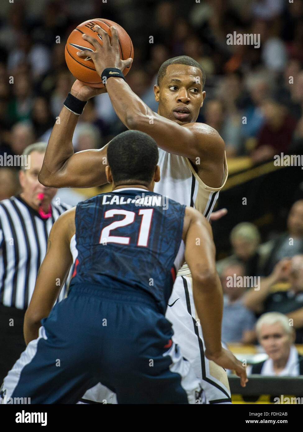 Orlando, FL, USA. 31st Jan, 2016. UConn guard Omar Calhoun (21) defends ...