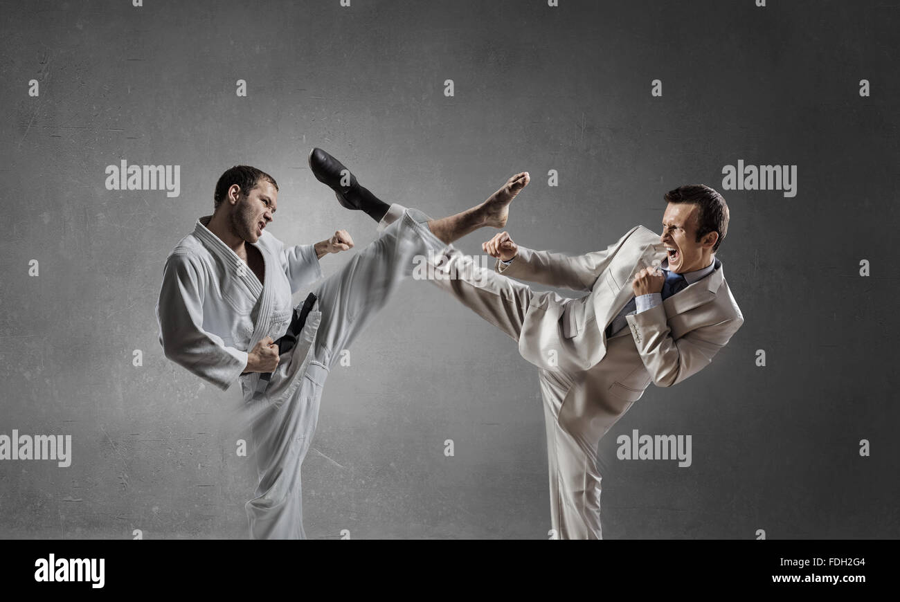 Businessman in martial arts fighting hi-res stock photography and ...