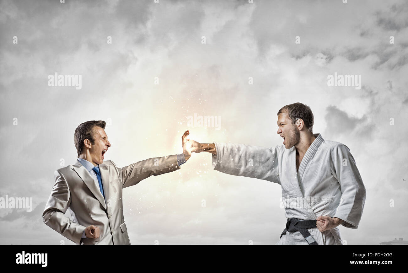 Businessman in martial arts fighting hi-res stock photography and ...