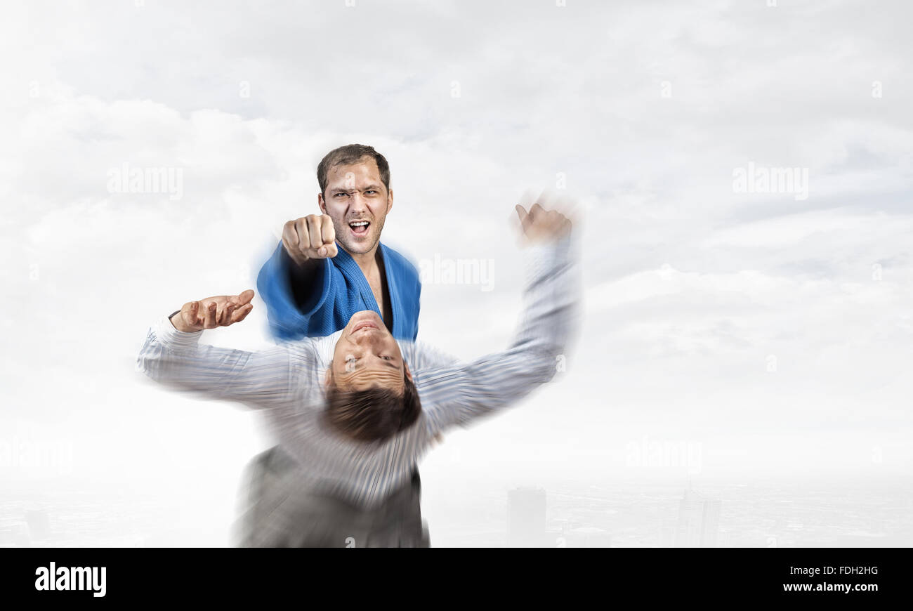 Businessman in martial arts fighting hi-res stock photography and ...