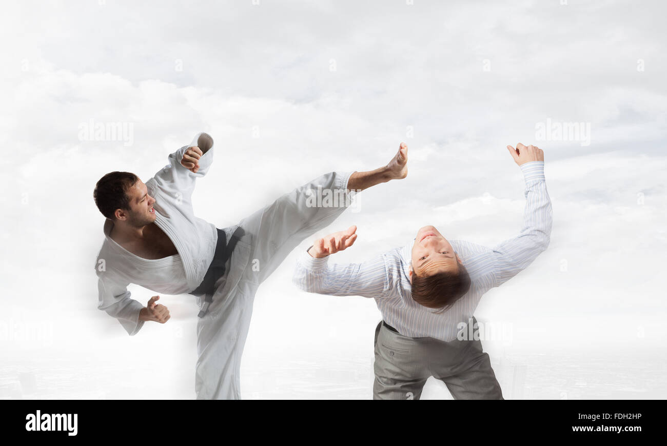 Businessman in martial arts fighting hi-res stock photography and ...
