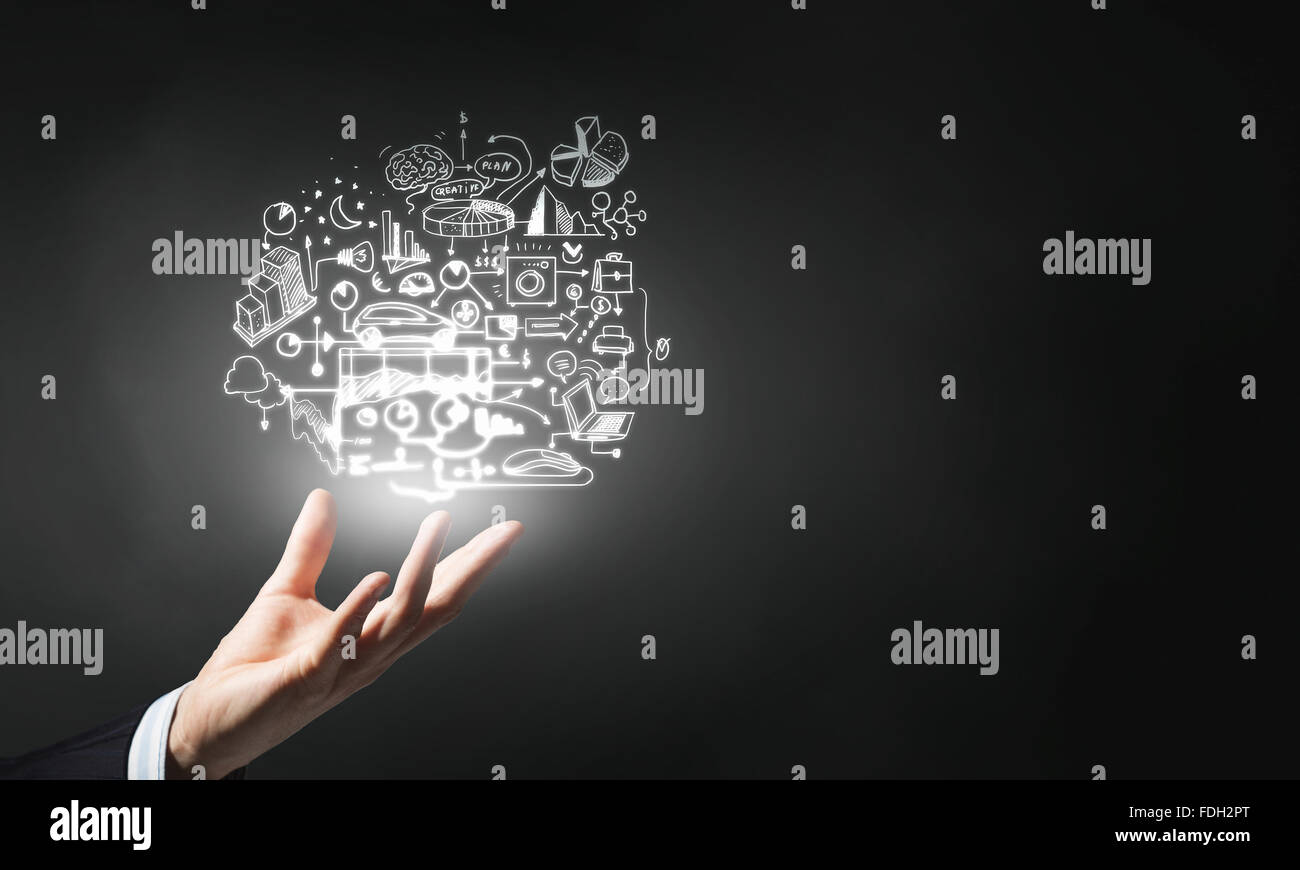 Businessman hand presenting business idea sketch on palm Stock Photo ...