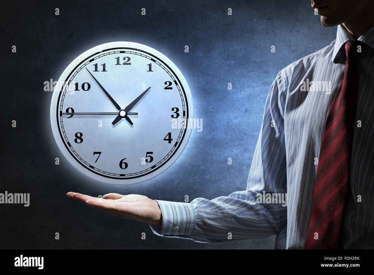 Close up image of human hand holding watch Stock Photo - Alamy