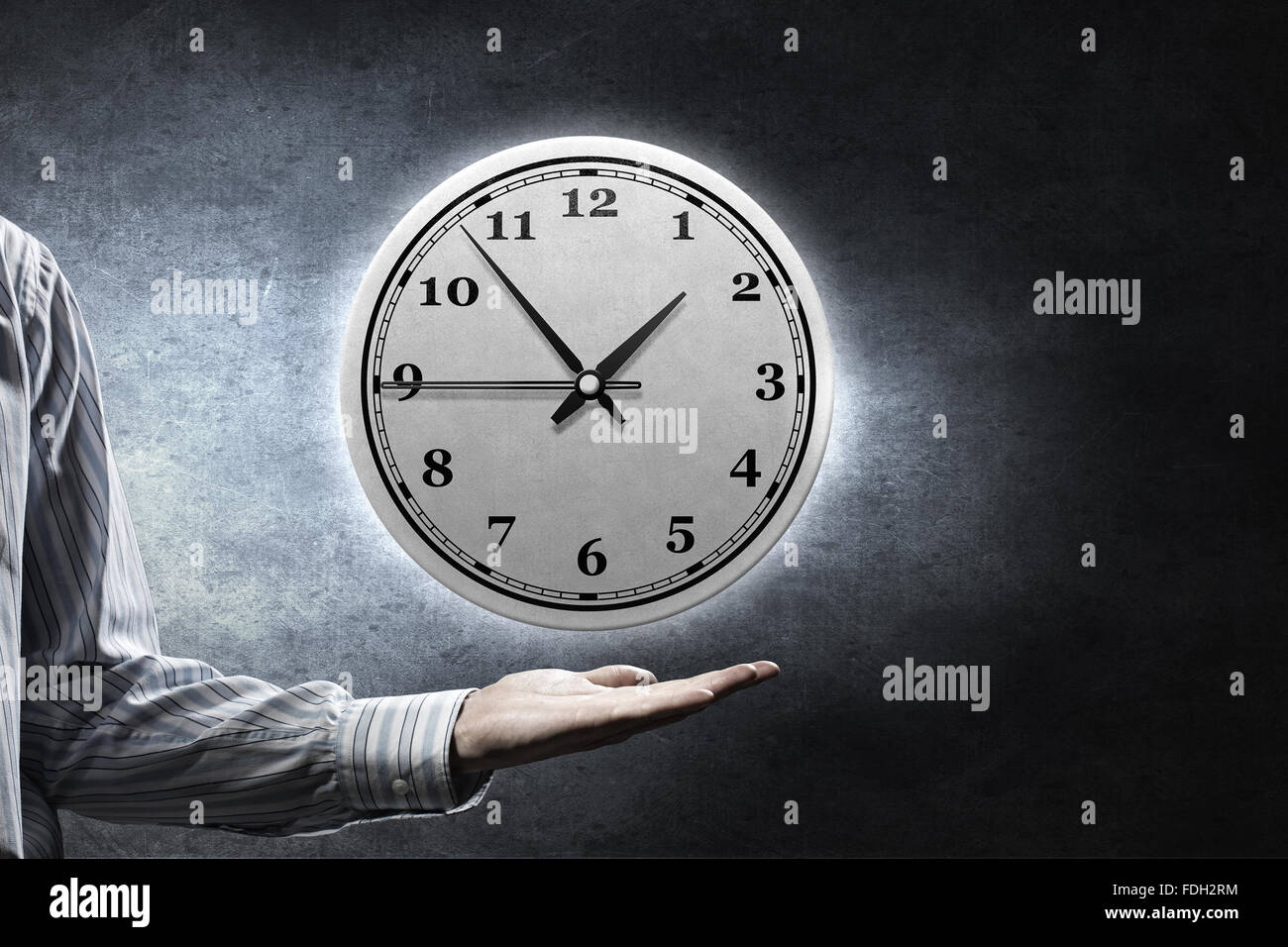 Close up image of human hand holding watch Stock Photo - Alamy