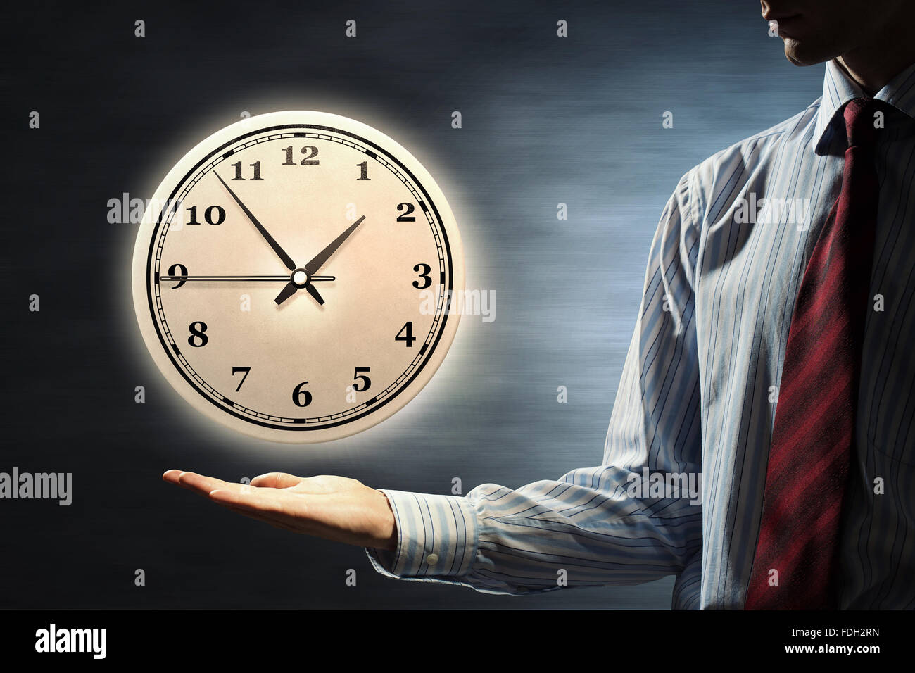 Close up image of human hand holding watch Stock Photo - Alamy