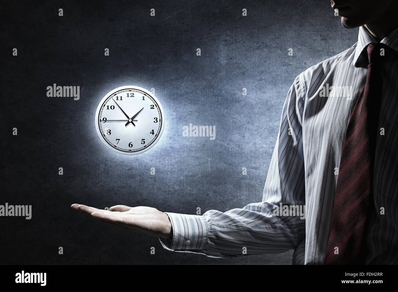 Close up image of human hand holding watch Stock Photo - Alamy