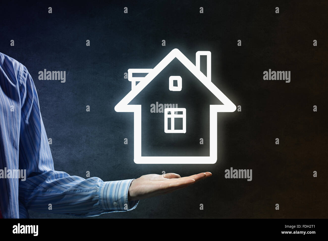 Hand of businessman showing house sign in palm Stock Photo - Alamy
