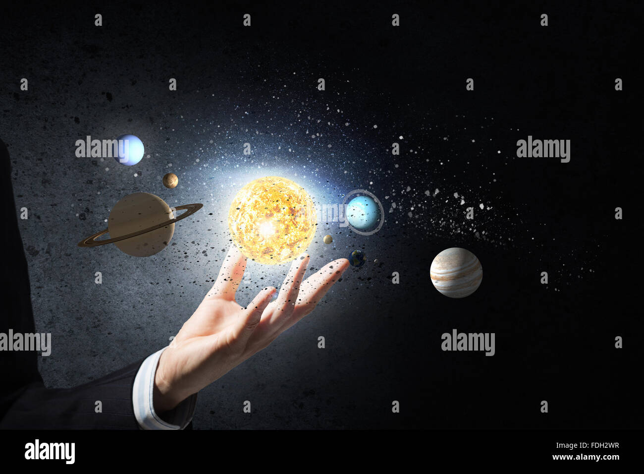 Close up of planet sun system in man hand Stock Photo - Alamy