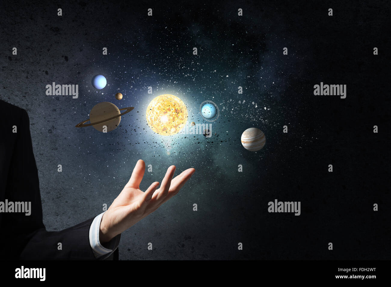Close up of planet sun system in man hand Stock Photo - Alamy