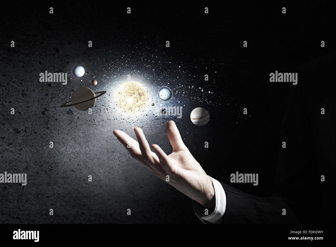 Close up of planet sun system in man hand Stock Photo - Alamy