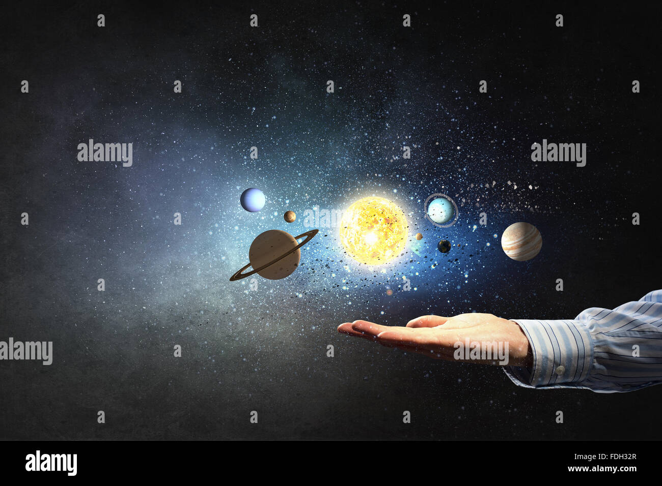 Close up of planet sun system in man hand Stock Photo - Alamy