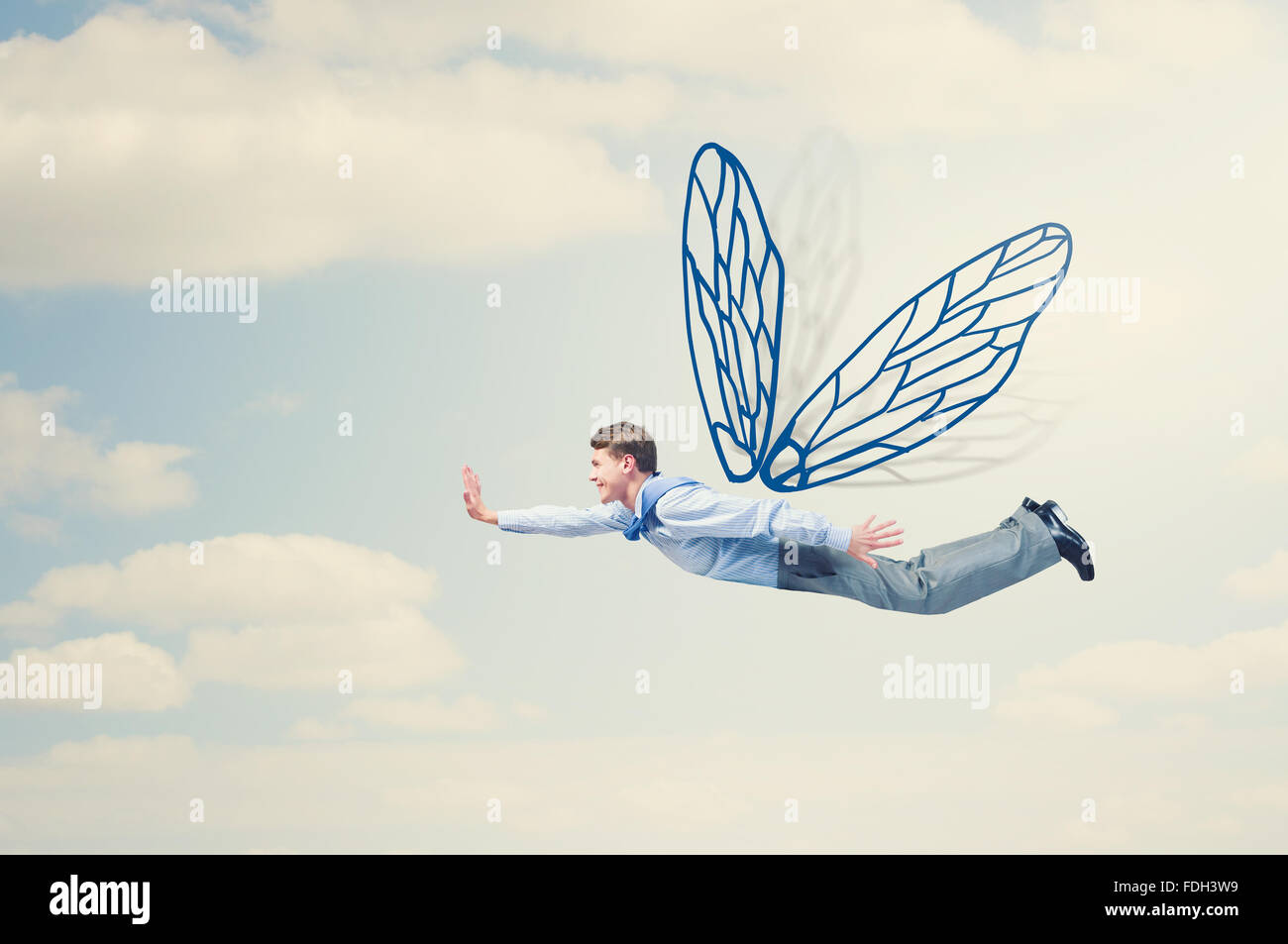 Business man flying fairy wings hi-res stock photography and images - Alamy