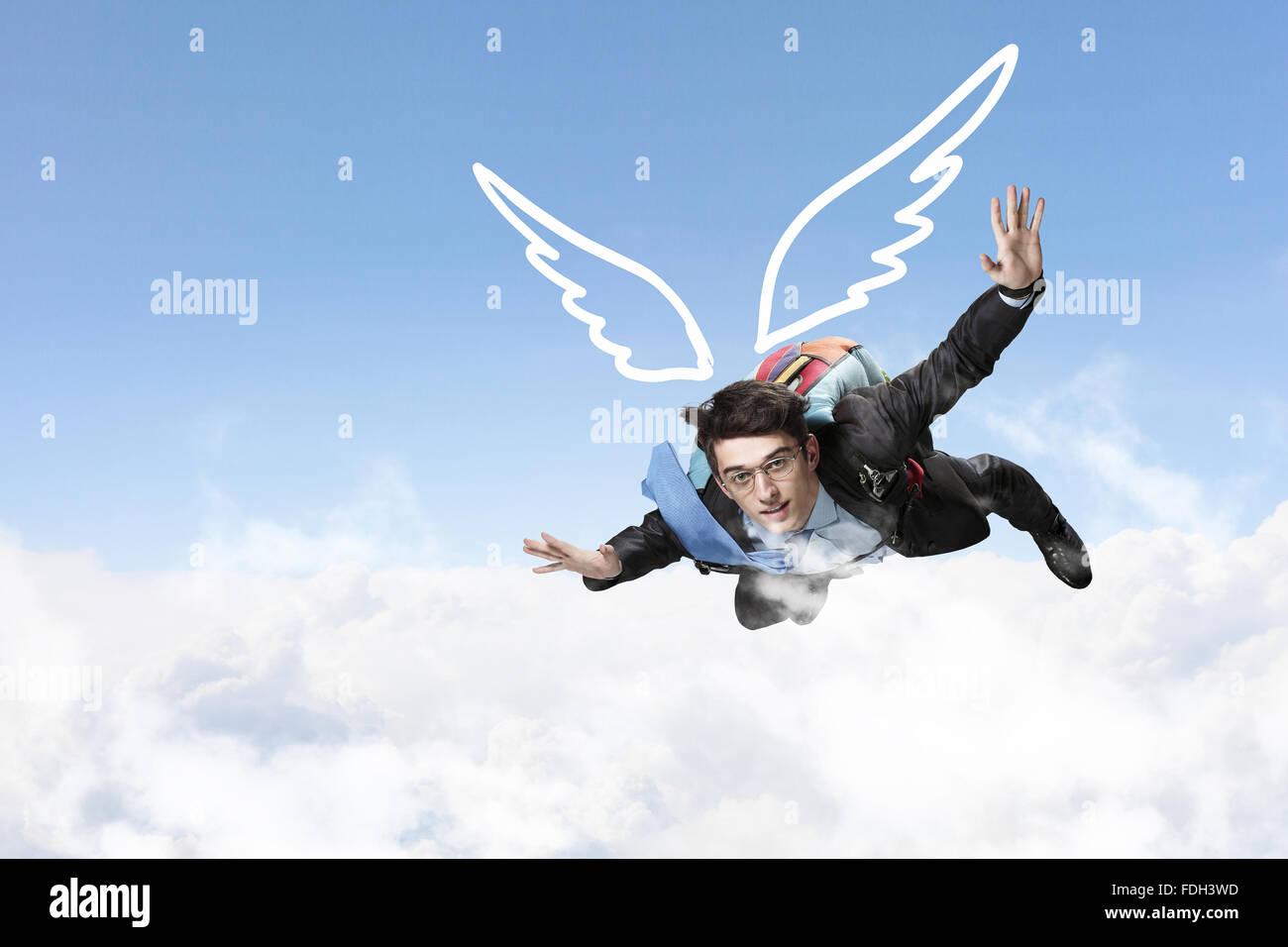Business man flying fairy wings hi-res stock photography and images - Alamy