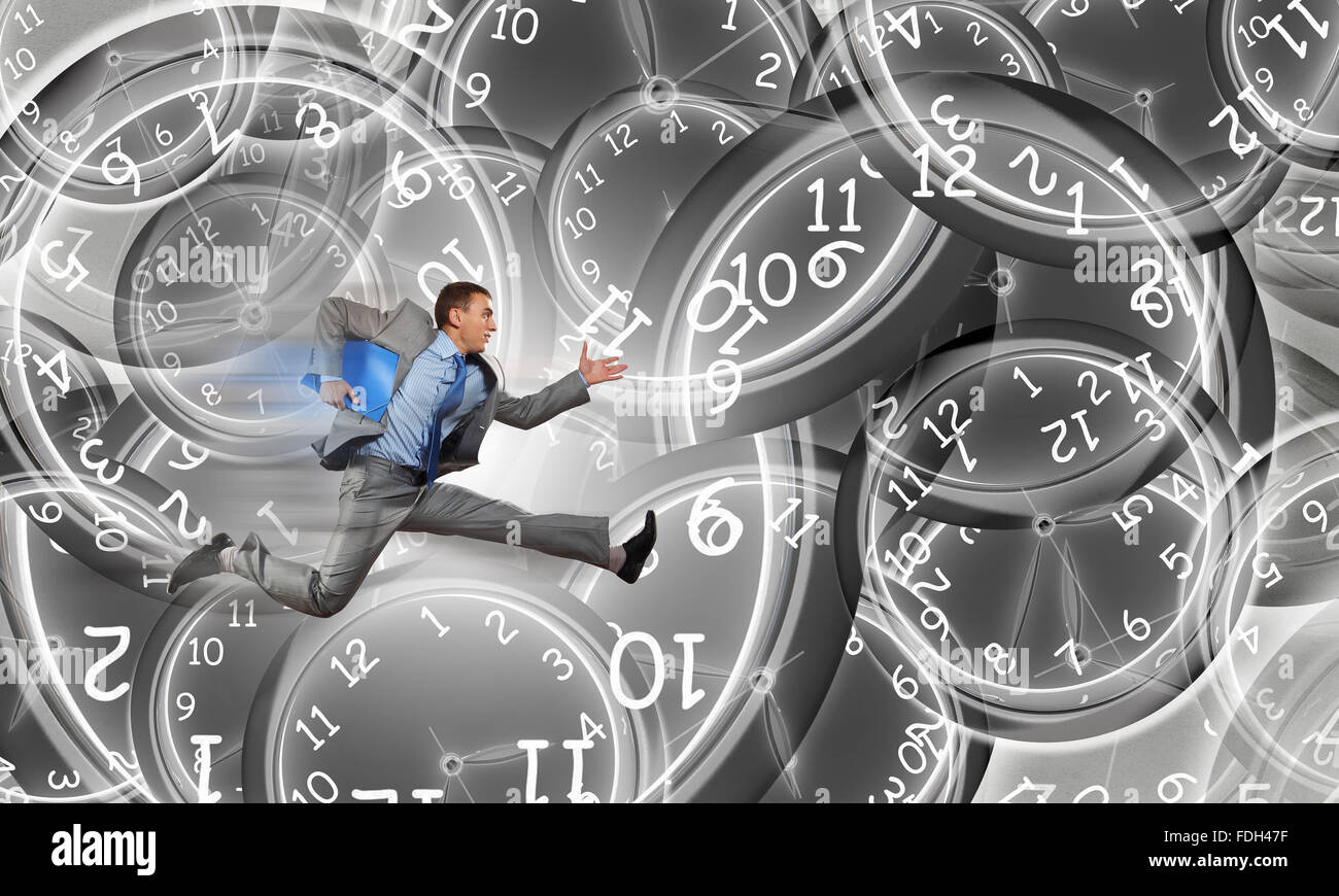 Concept of time with funny businessman running in a hurry Stock Photo ...