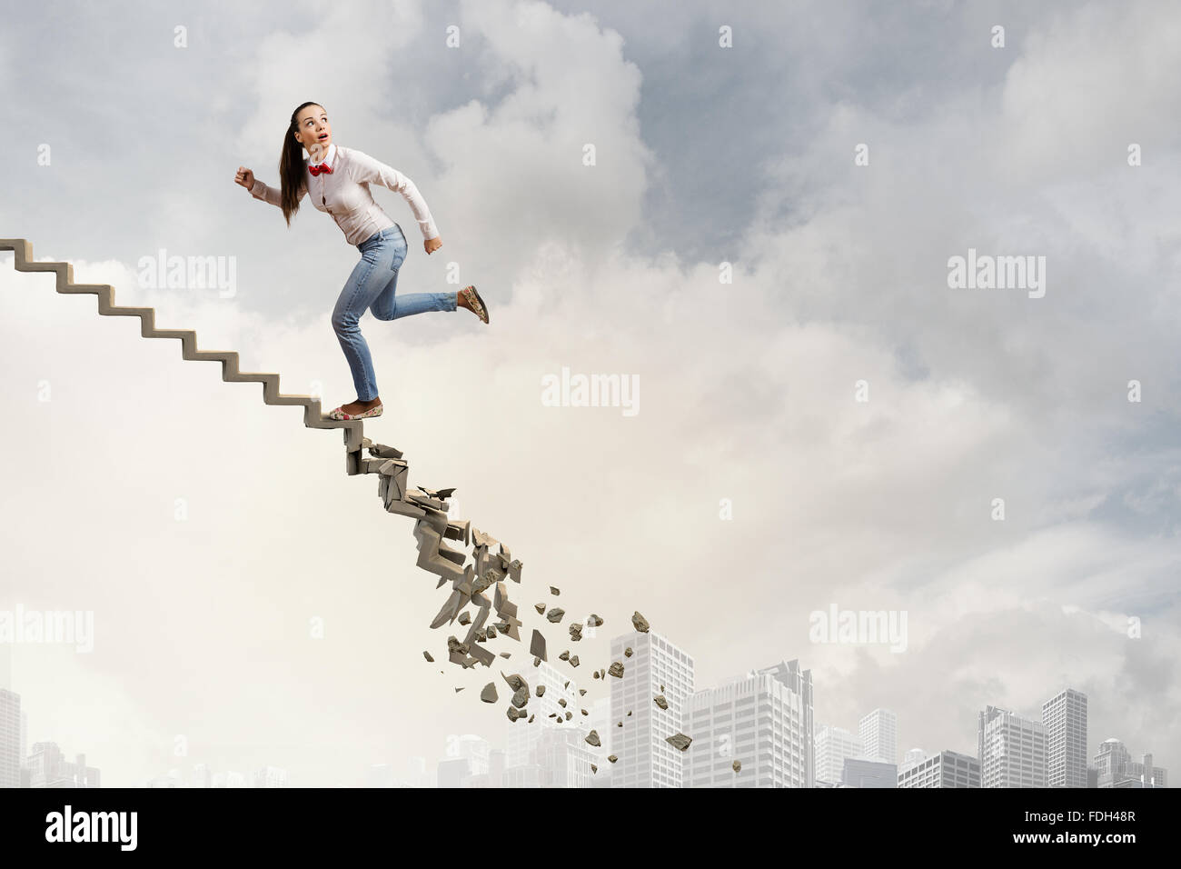 Young woman walking up collapsing staircase representing success ...