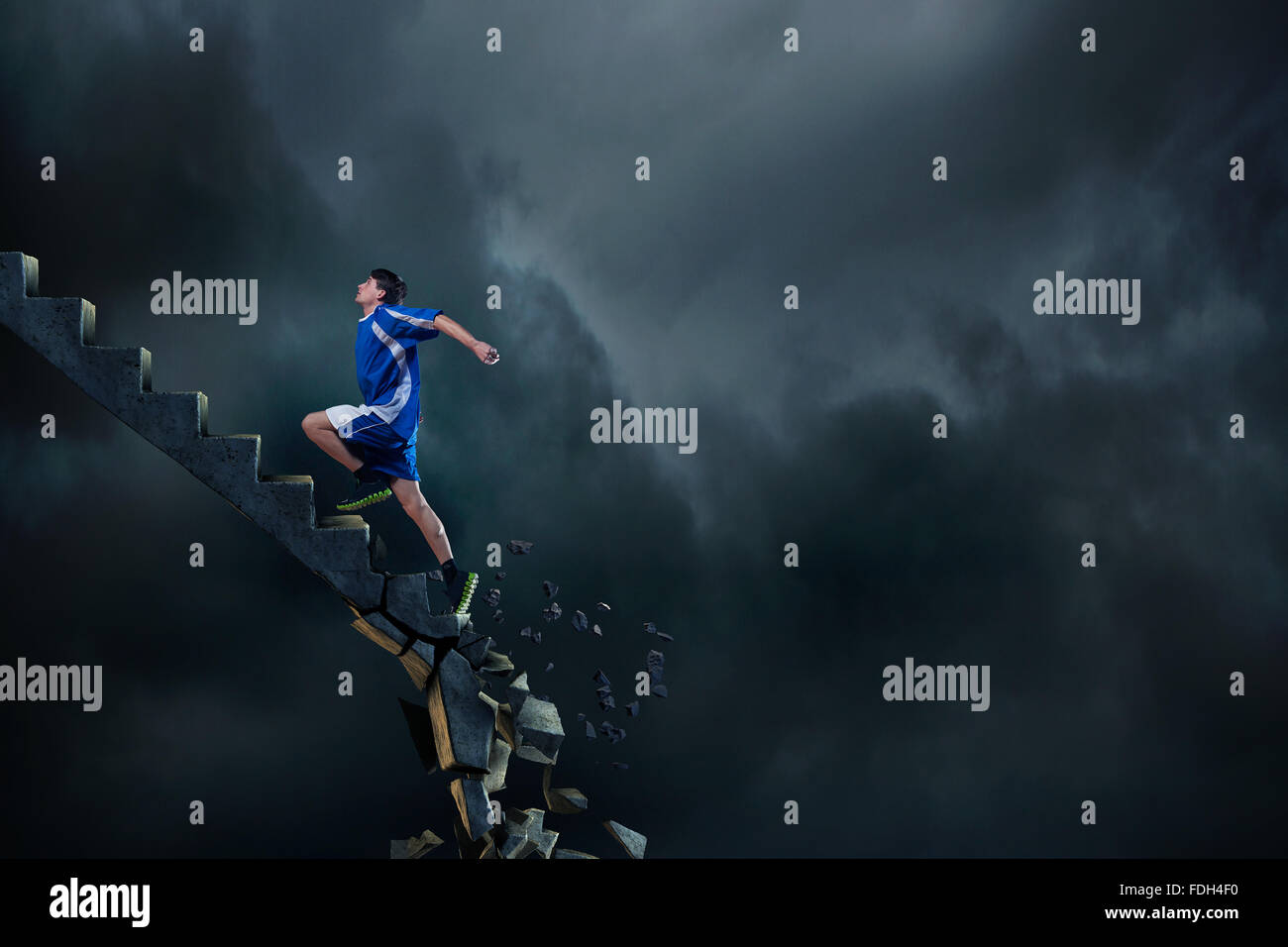 Sports active man running on stone collapsing ladder Stock Photo - Alamy