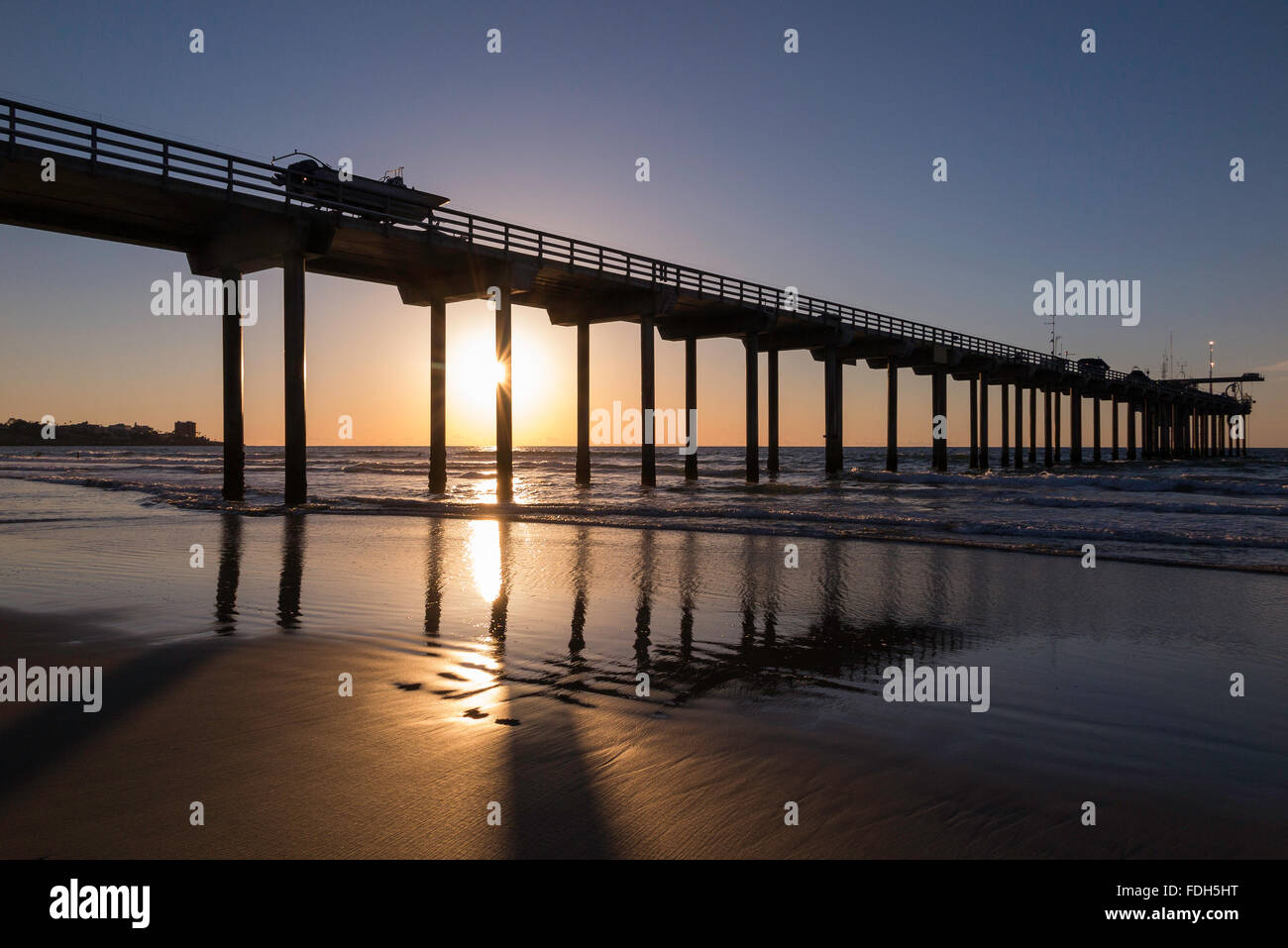 Silhouette of a Scripps Institution of Oceanography Pier during sunset ...
