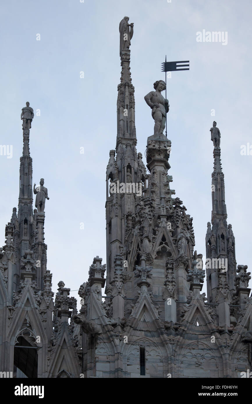 Marble statues of Saints on the spires of the Milan Cathedral (Duomo di ...