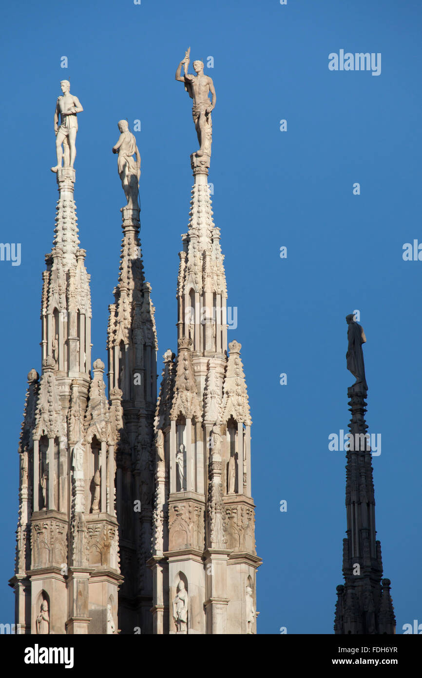 Marble statues of Saints on the spires of the Milan Cathedral (Duomo di ...