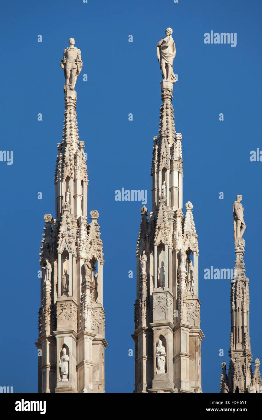 Marble statues of Saints on the spires of the Milan Cathedral (Duomo di ...