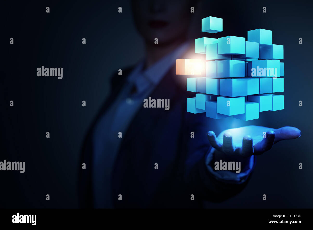 Businesswoman hand shows cube as symbol of problem solving Stock Photo ...